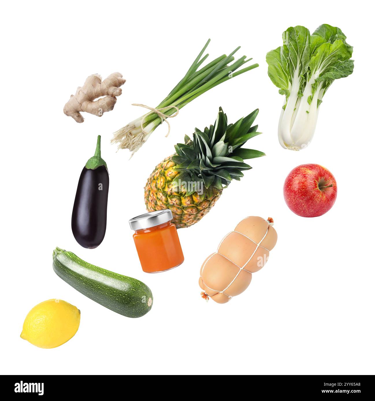 Different products in air on white background Stock Photo - Alamy