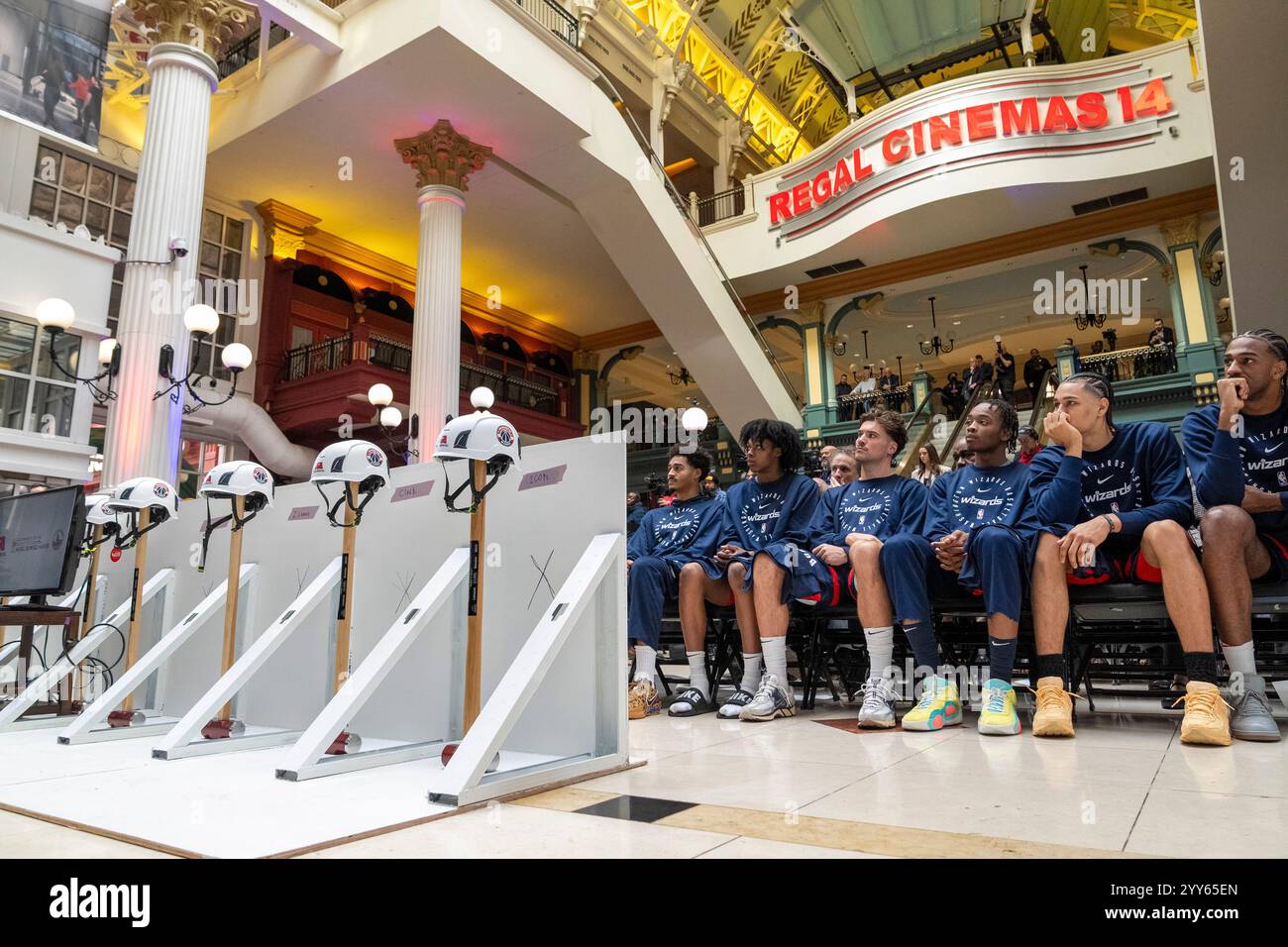Members of the Washington Wizards NBA Basketball team listen during an ...