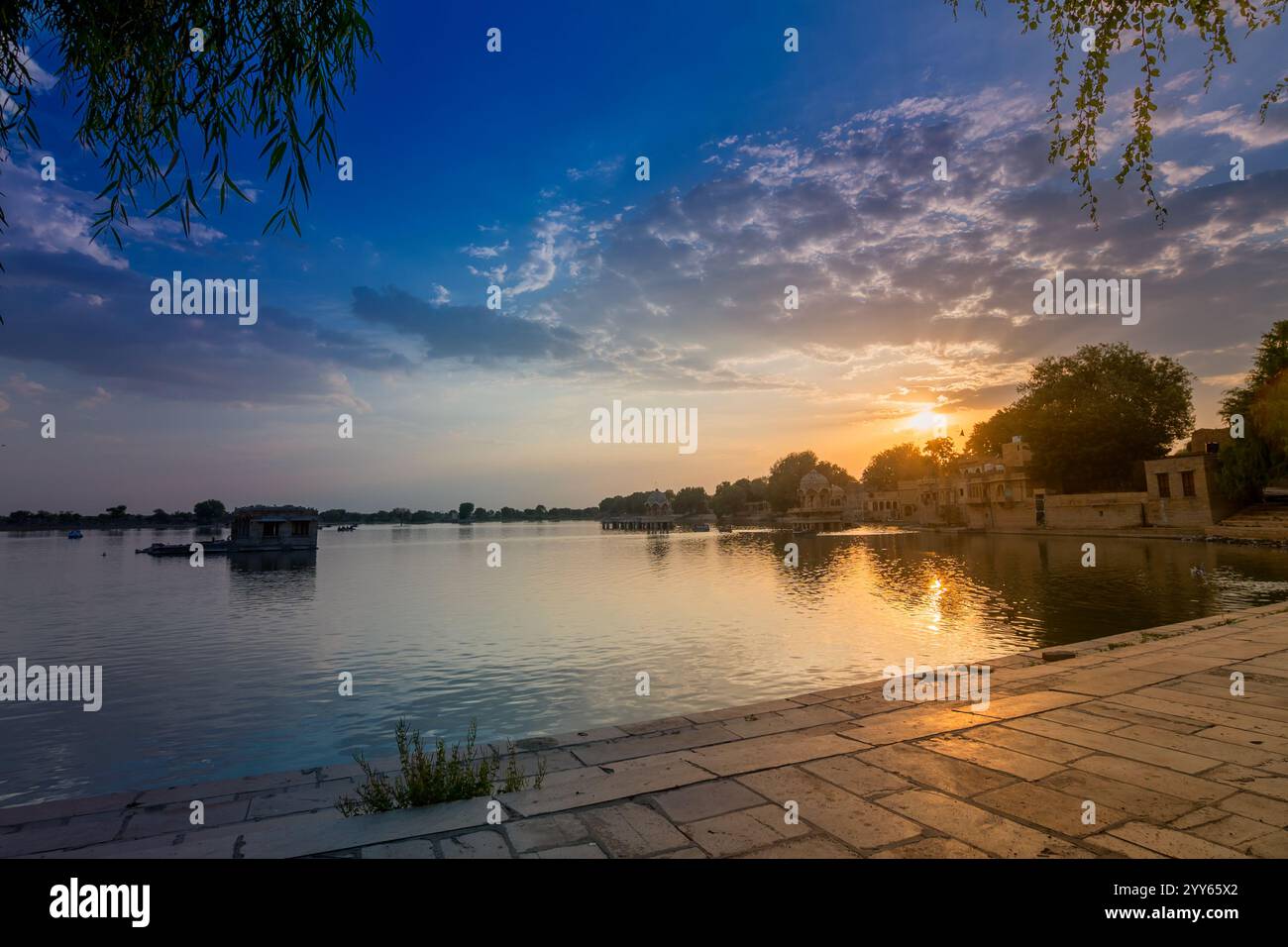 Beautiful sunset at Gadisar lake, Jaisalmer, Rajasthan, India. Setting ...