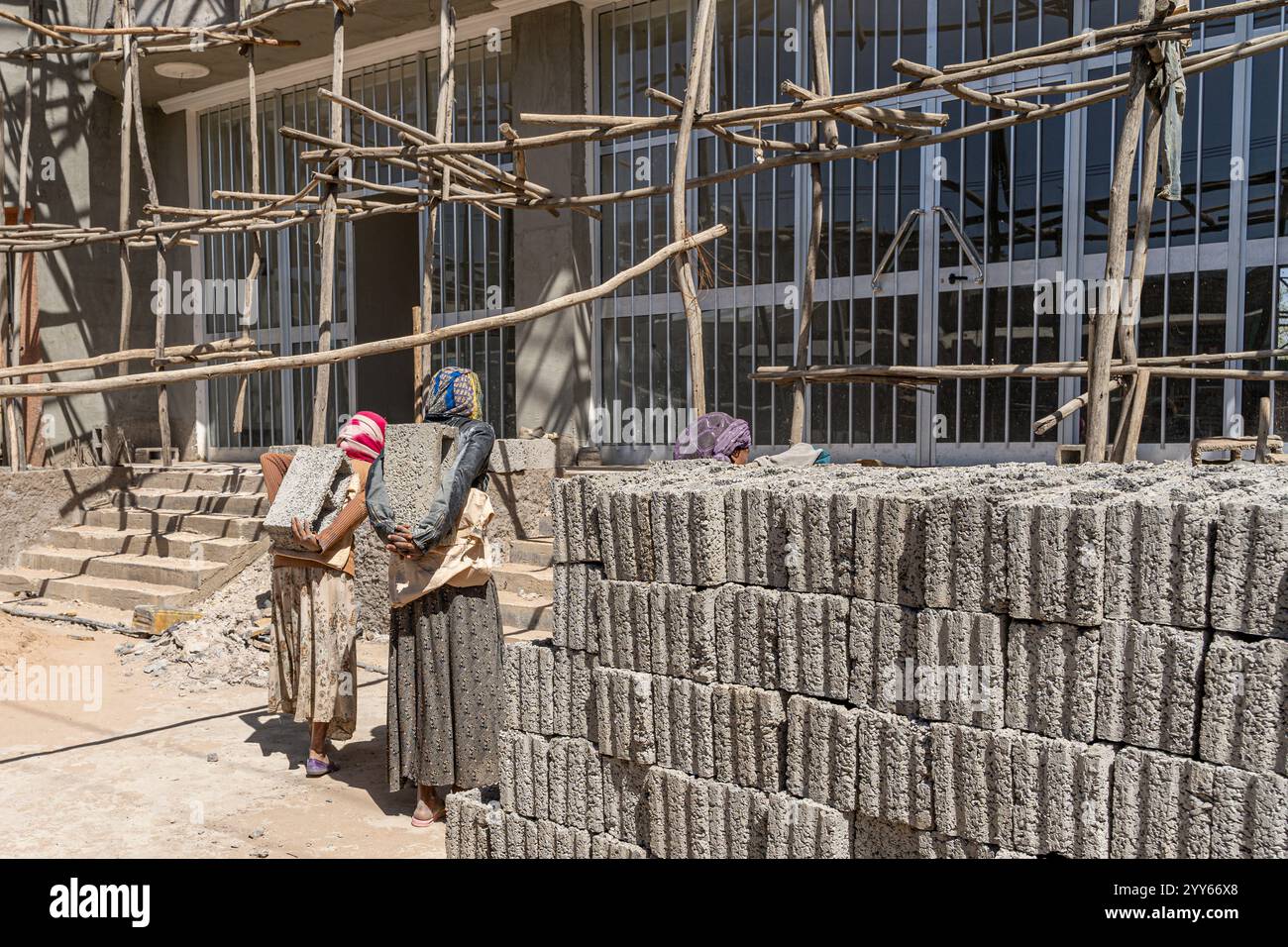 Old women carrying large stones to build a new Building, Addis Ababa ...