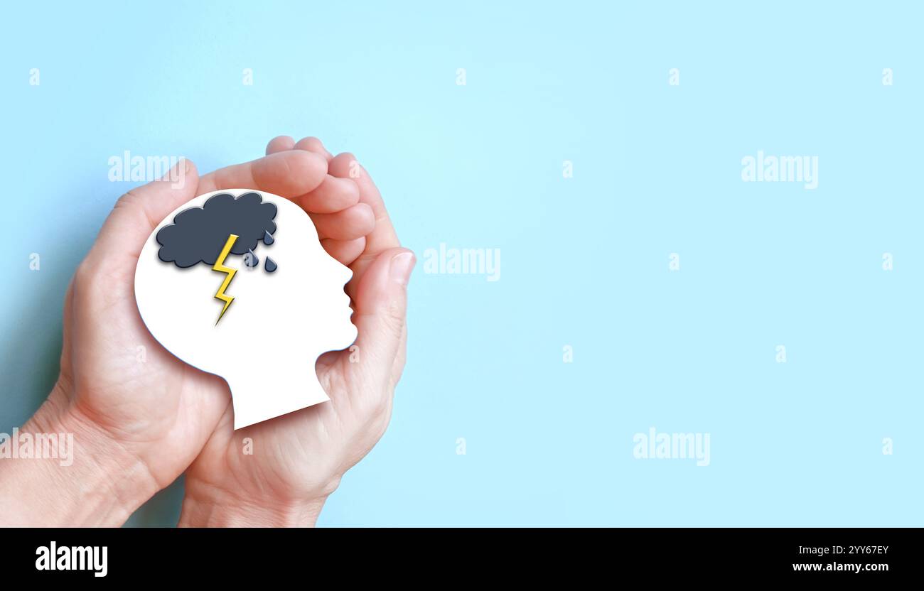 Hands holding paper brain with storm, rain, cloud, mental health, self ...