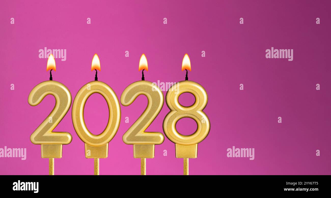 Happy New Year 2028 - Candles in the form of lit numbers Stock Photo ...