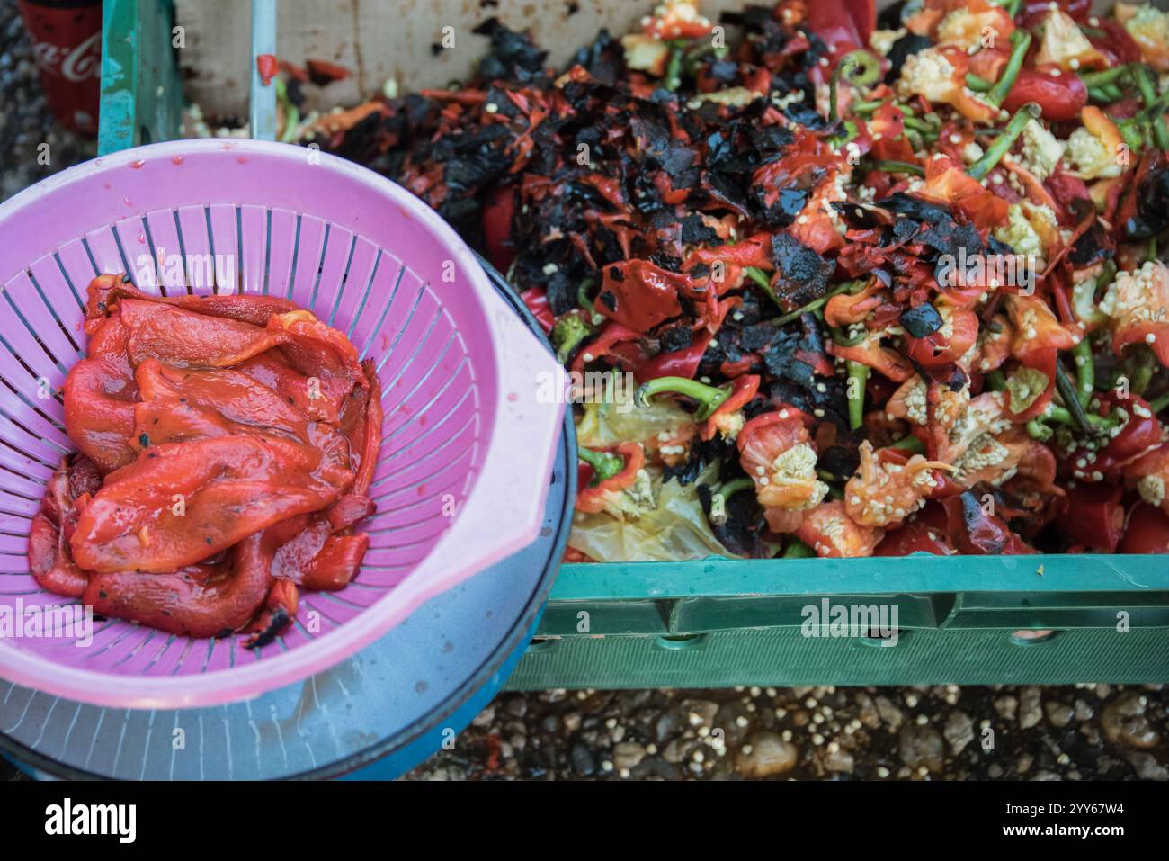 Cleaning peppers to prepare it for making ajvar Stock Photo - Alamy
