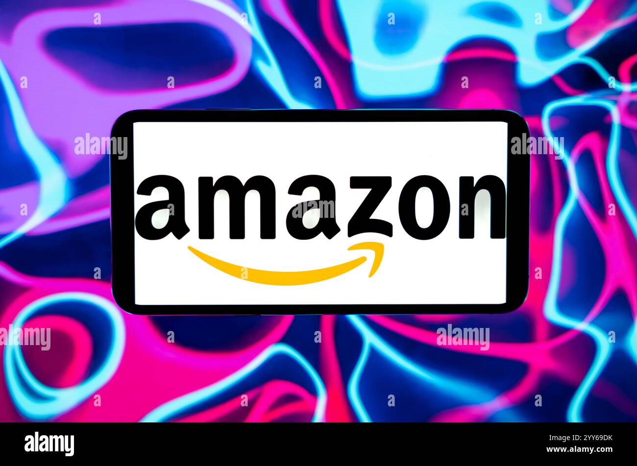 In this photo illustration, the Amazon logo is seen displayed on a ...
