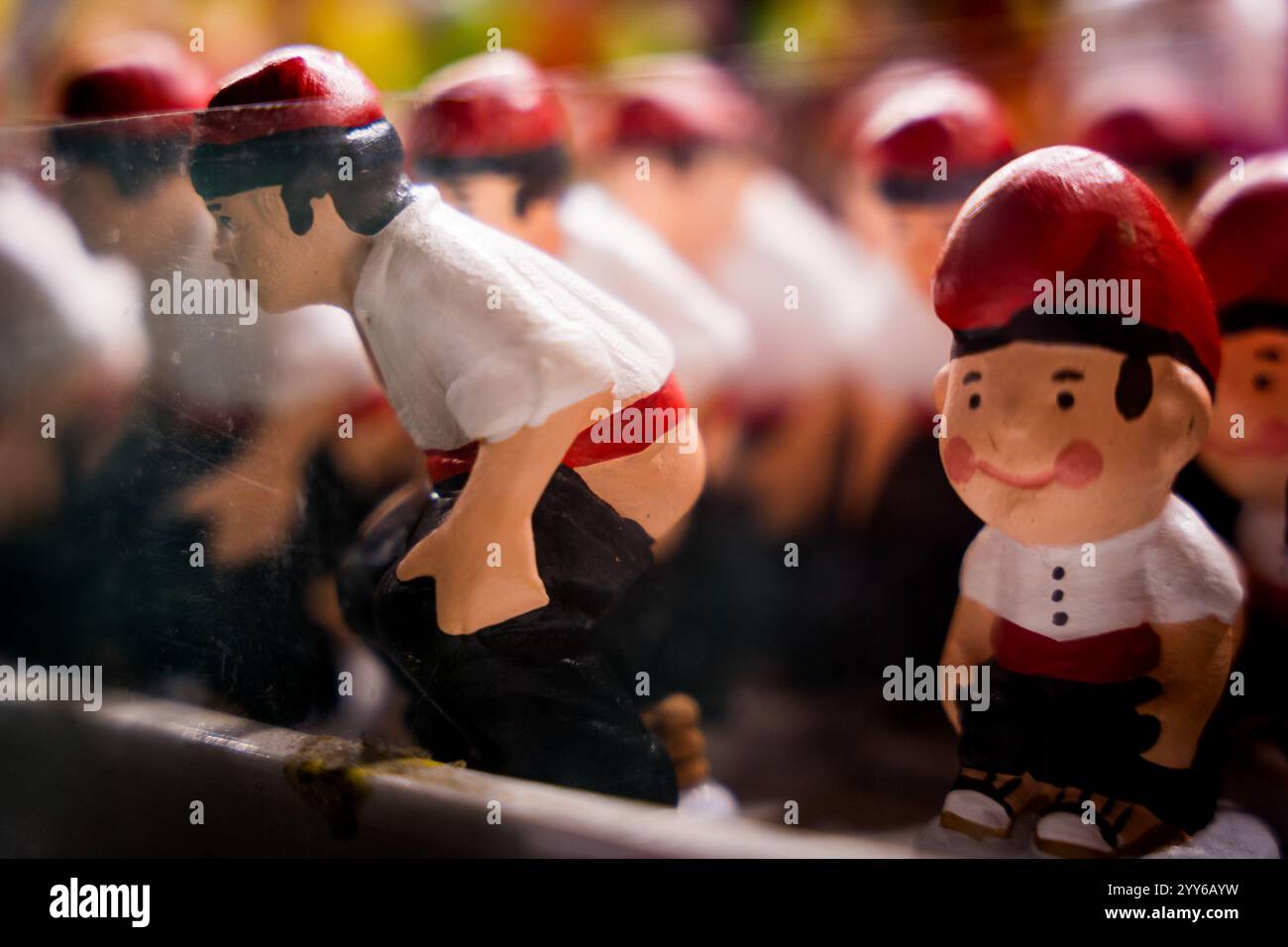 Traditional catalan statues called "caganers" are seen in a stall at a ...