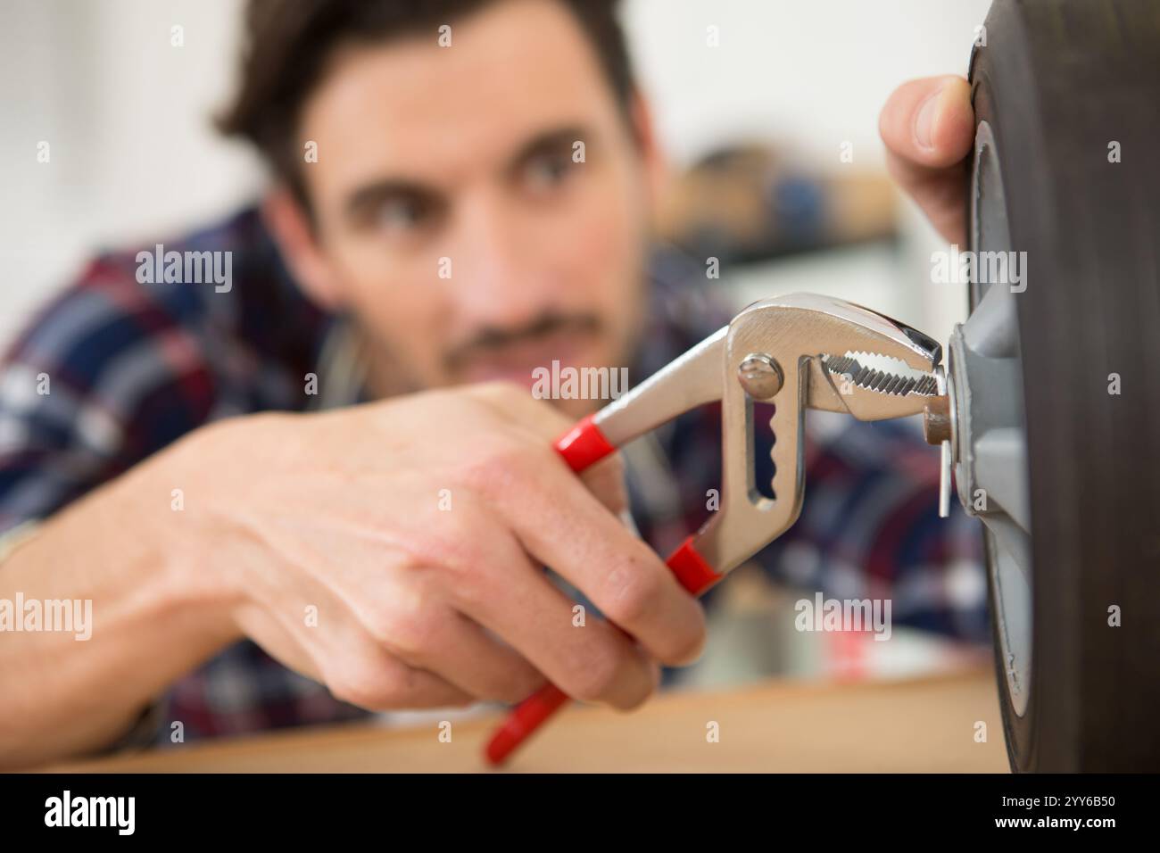 Hole pliers hi-res stock photography and images - Alamy