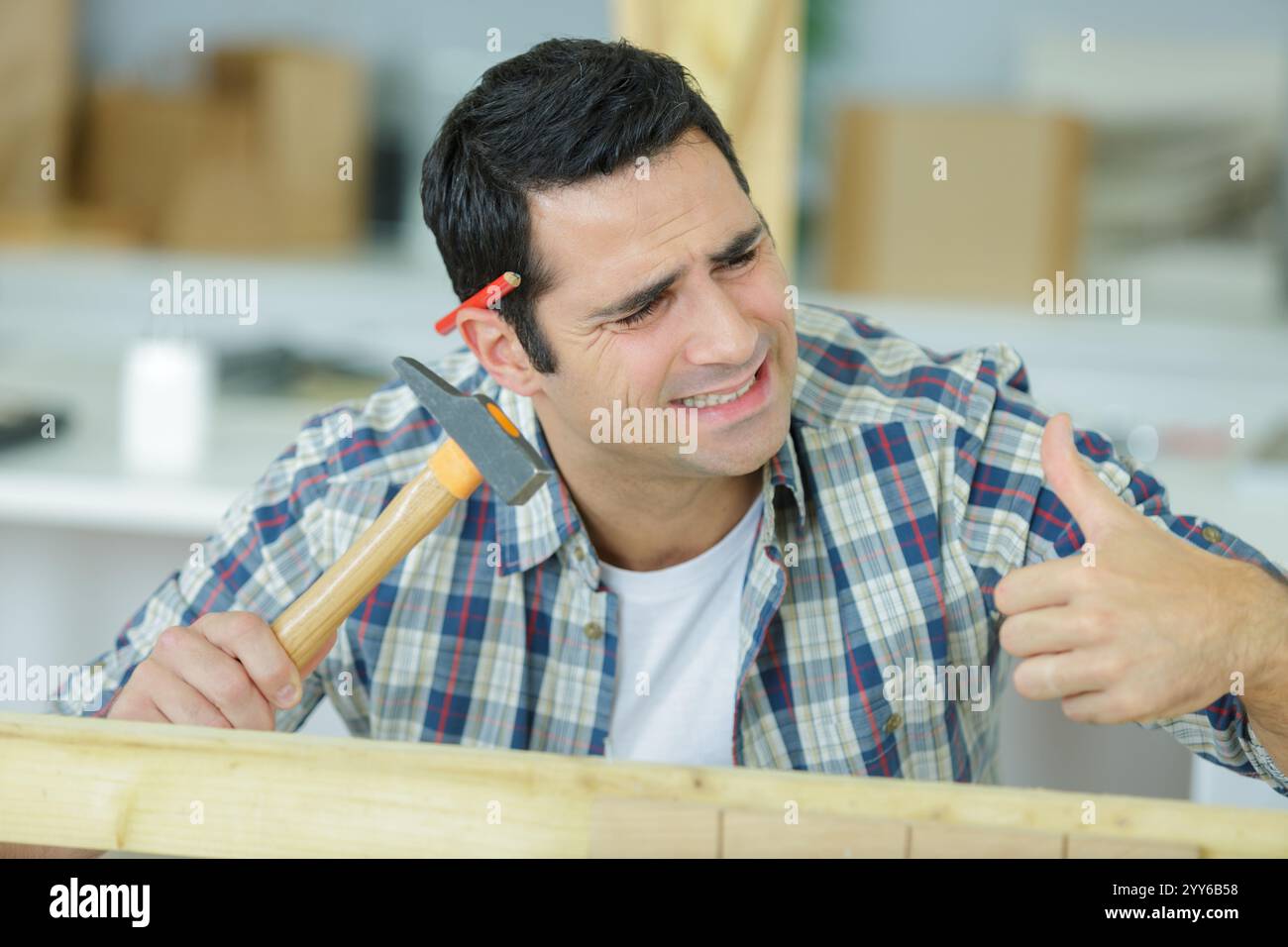 'hammer finger' hi-res stock photography and images - Alamy