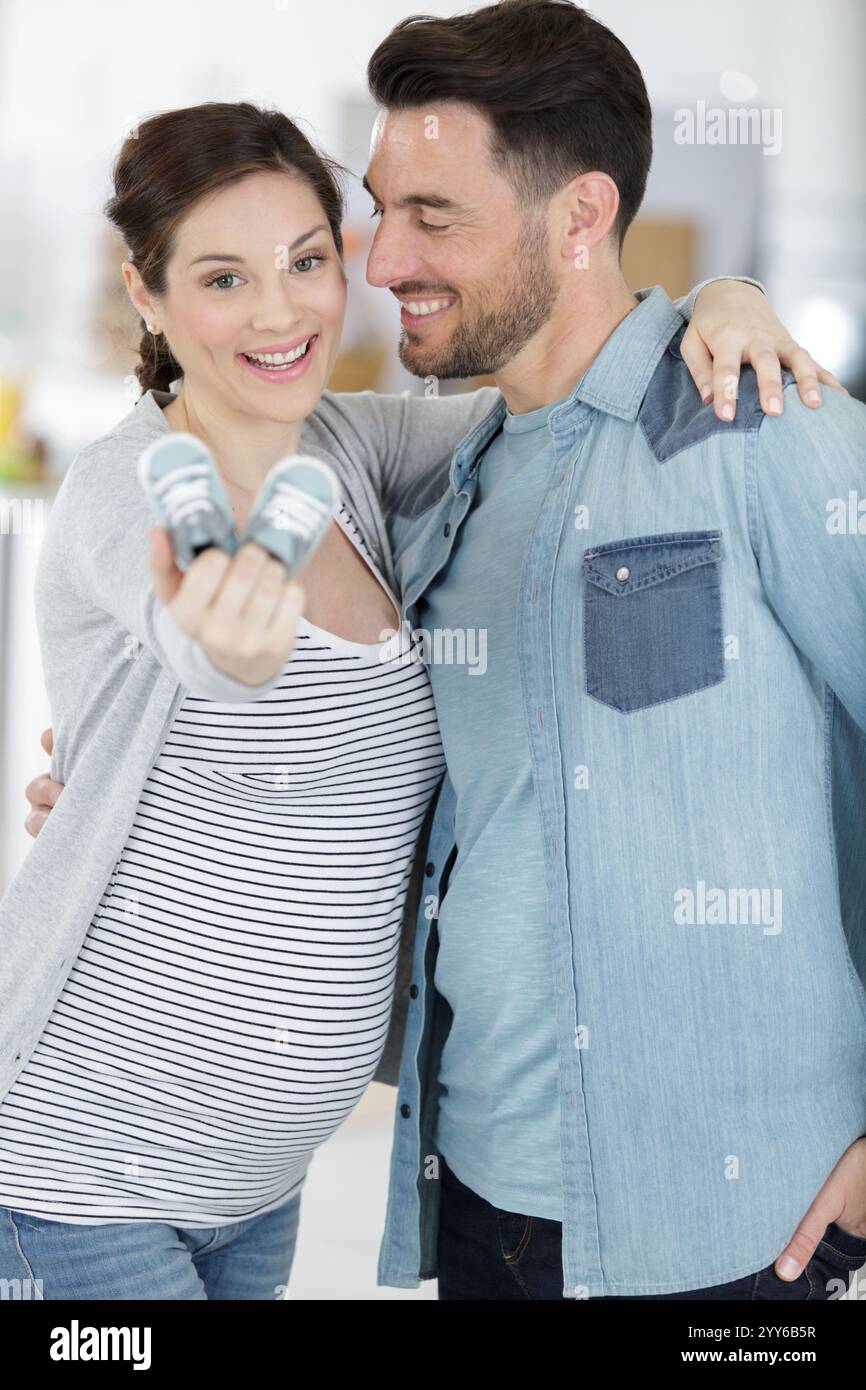 baby shows happiness of expecting family Stock Photo - Alamy