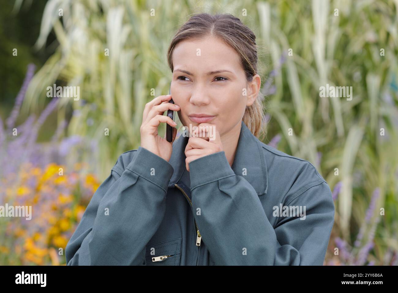 Female gardener using smart hi-res stock photography and images - Alamy