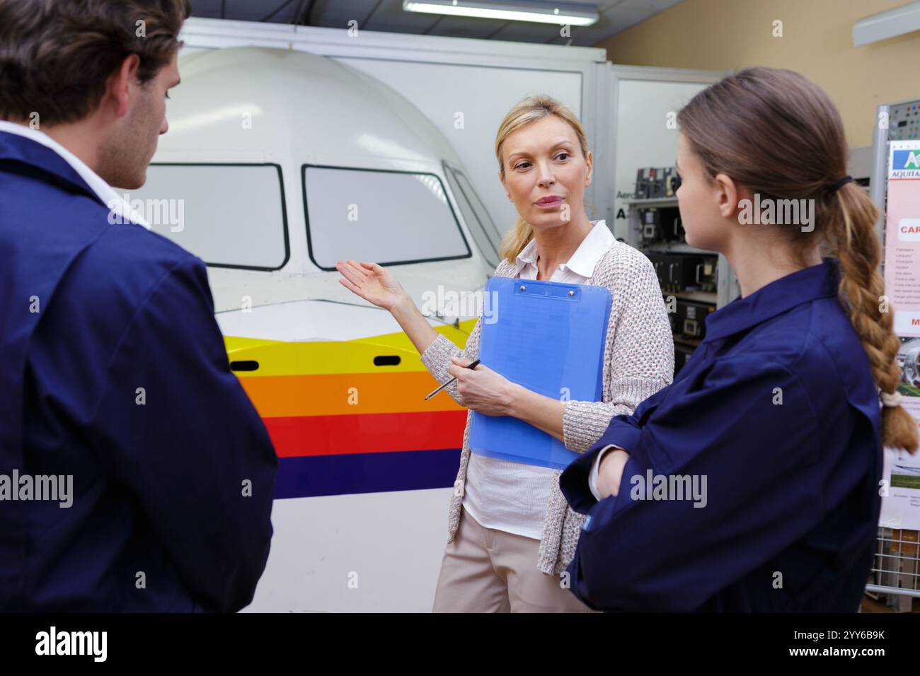team of engineers learning aircraft component Stock Photo - Alamy
