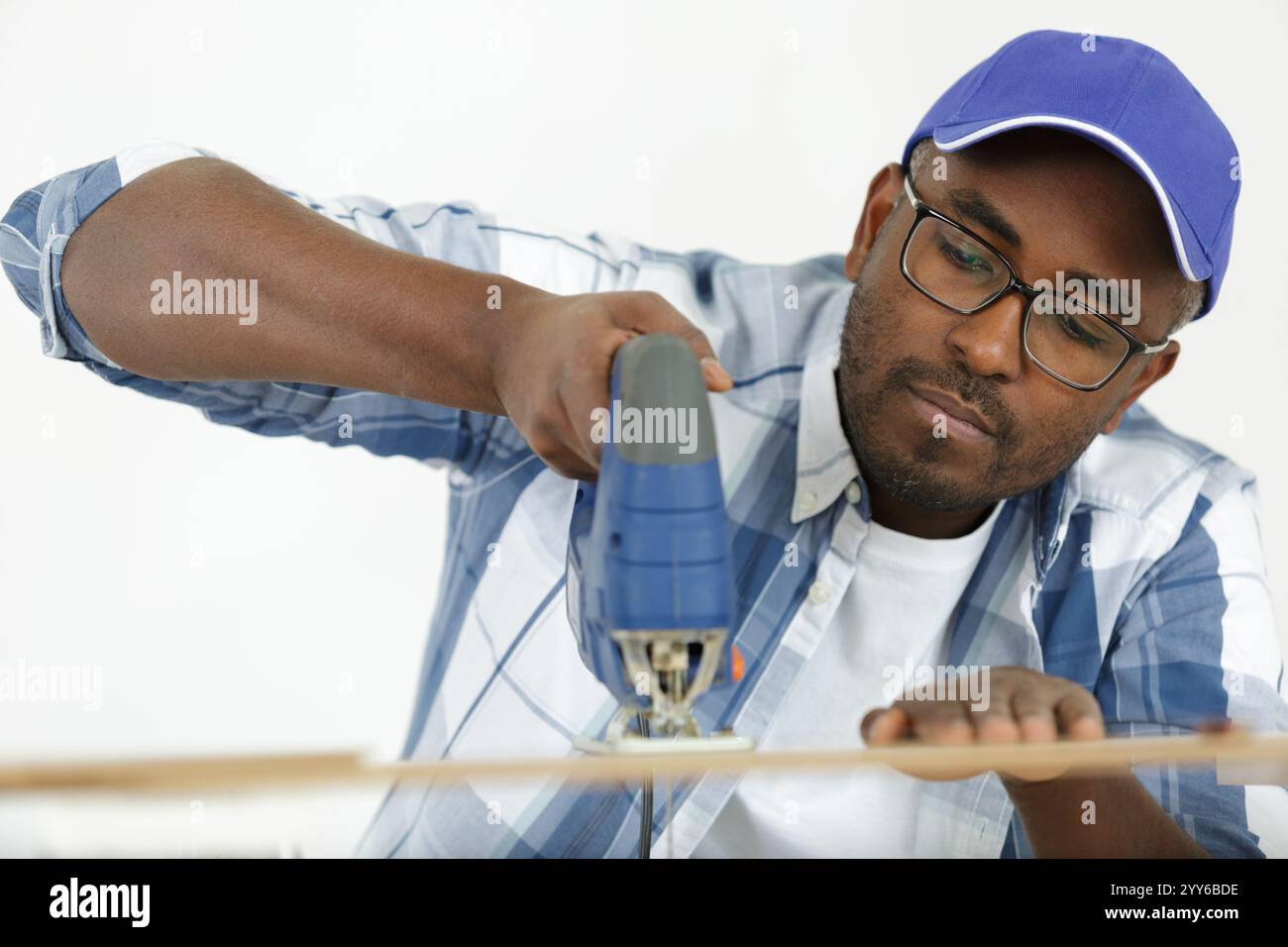 Male carpenter using sander hi-res stock photography and images - Alamy