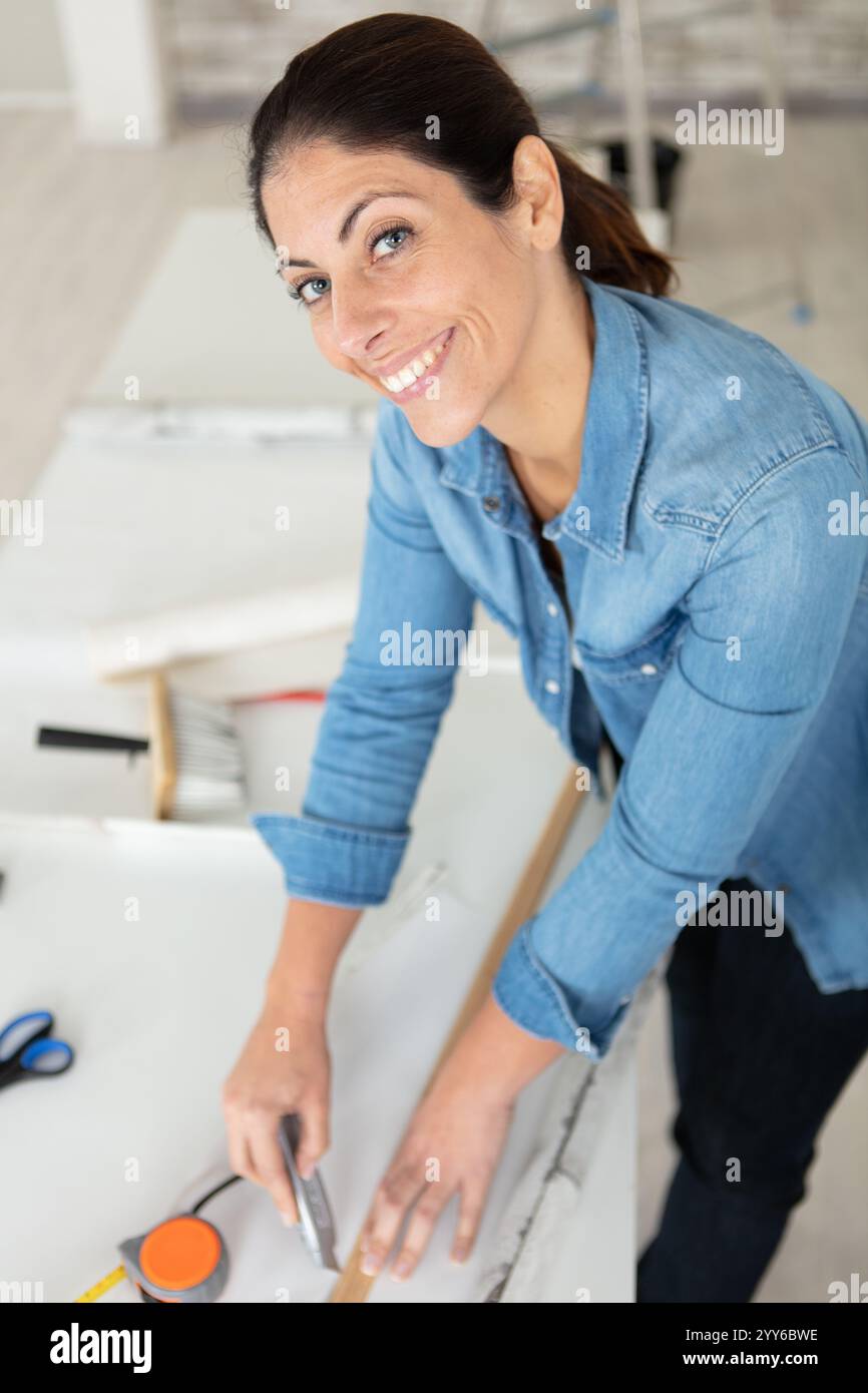 mature woman doing hobby diy in home Stock Photo - Alamy