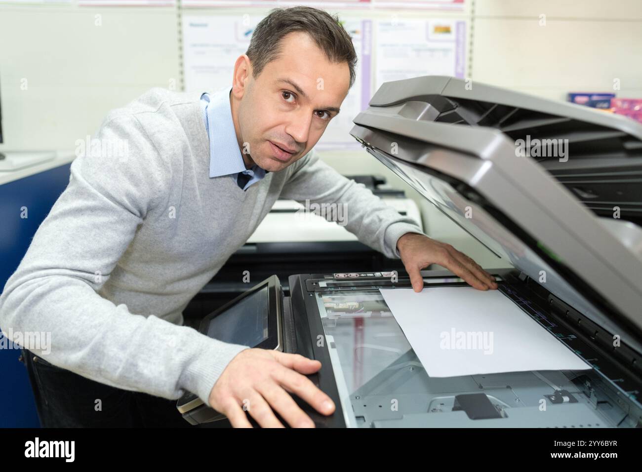 Businessman using fax machine hi-res stock photography and images - Alamy