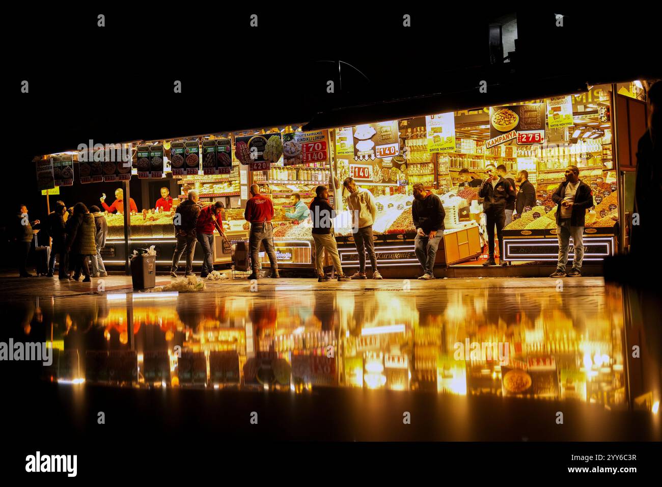 Food sellers wait for customers in a street market at the Egyptian ...
