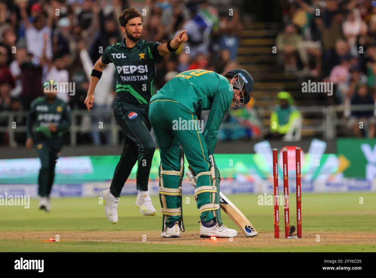 Pakistan bowler Shaheen Afridi celebrates while South Africa's Marco ...