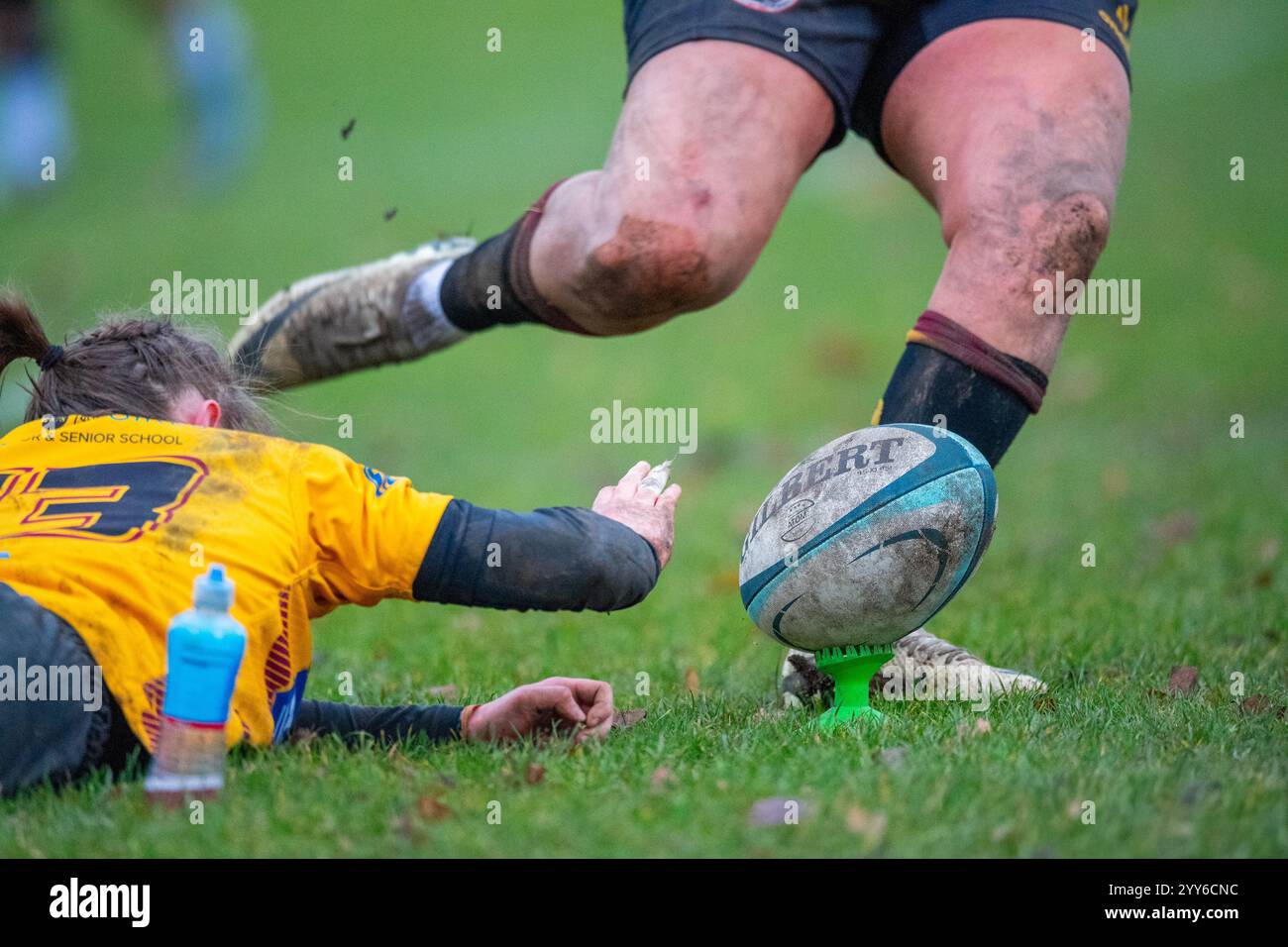 Female amateur rugby union football players playing a game of rugby and ...
