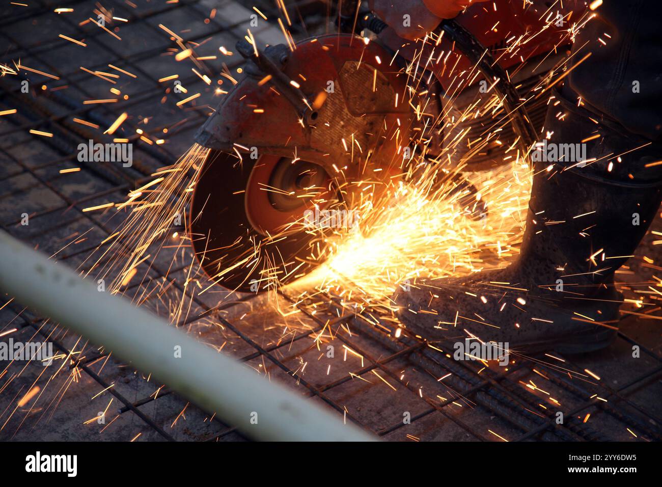 cutting rebar for street restorations Stock Photo - Alamy