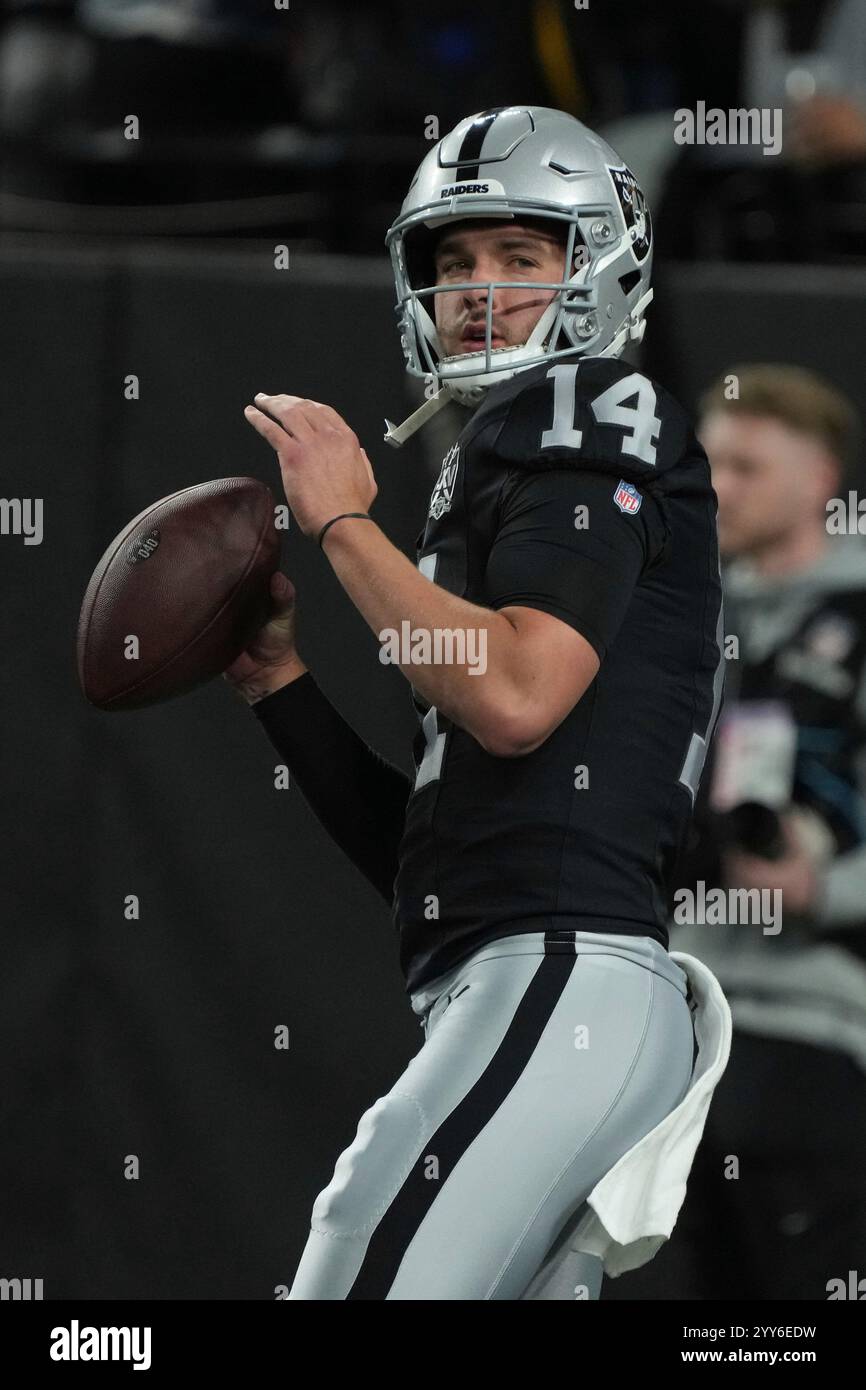 Las Vegas Raiders quarterback Carter Bradley (14) warms up against the ...