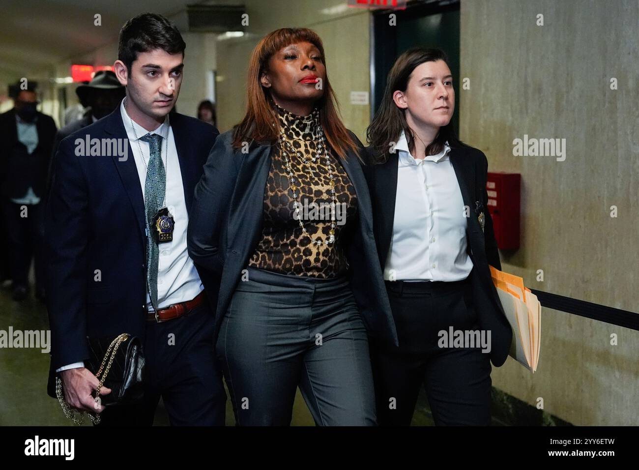 Ingrid Lewis-Martin is escorted into Manhattan criminal court, Thursday ...
