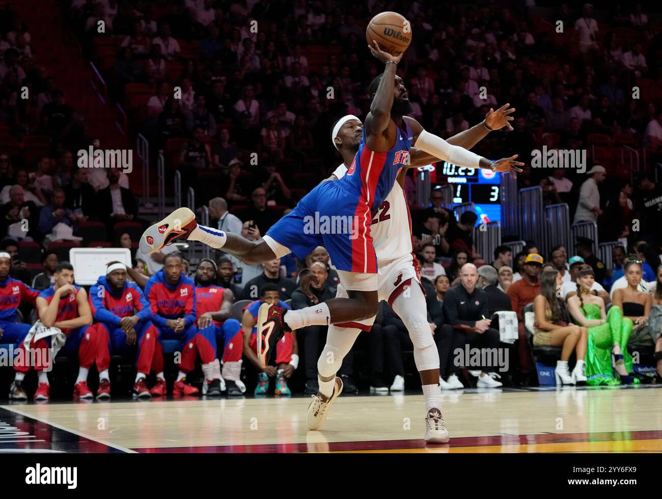 Detroit Pistons forward Tim Hardaway Jr., front, is fouled by Miami ...