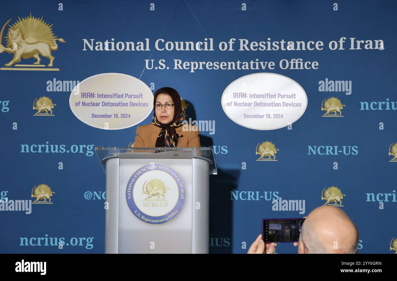 Ms. Soona Samsami, NCRI US Representative, is seen opening the press conference with a ...