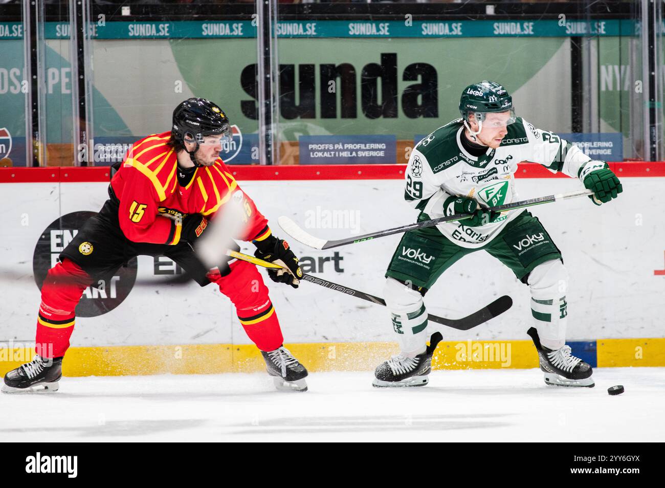 241219 Brynäs Charles-Édouard D'astous och Färjestads Oskar Steen under ishockeymatchen i SHL ...