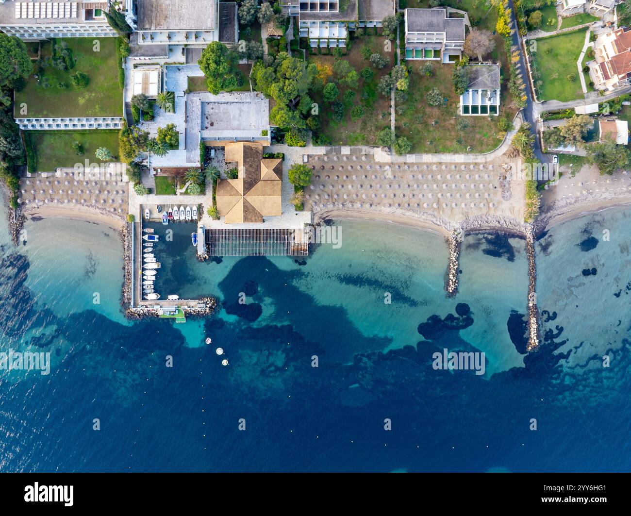 Aerial view of coastal resort with marina, beach, and buildings Stock ...