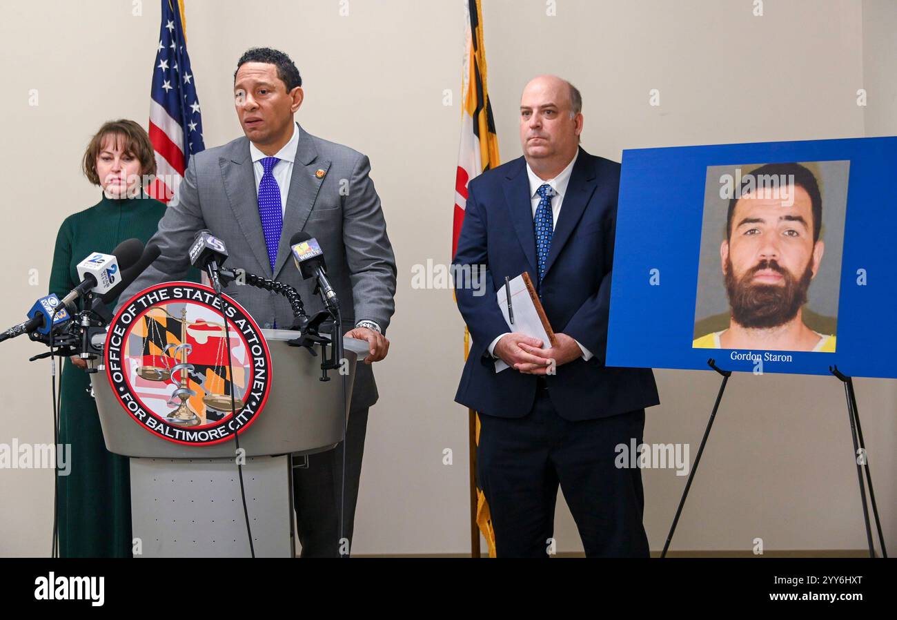 FILE - Baltimore State's Attorney Ivan J. Bates, center, speaks at a ...