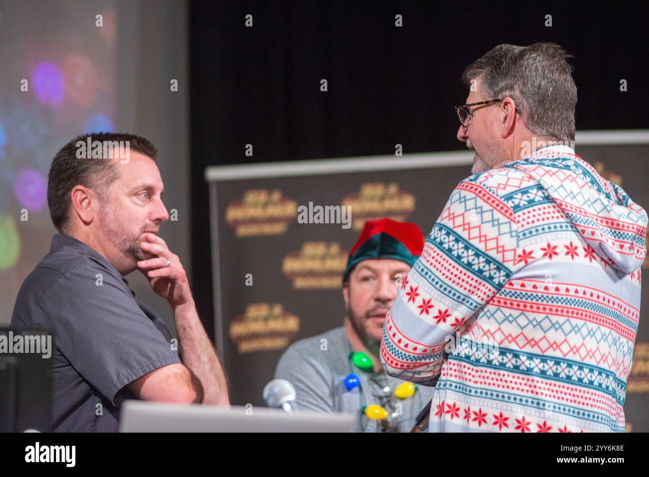 From left, program Director Chuck Damico, Nick McIlwain and Preston Elliot chat during a ...