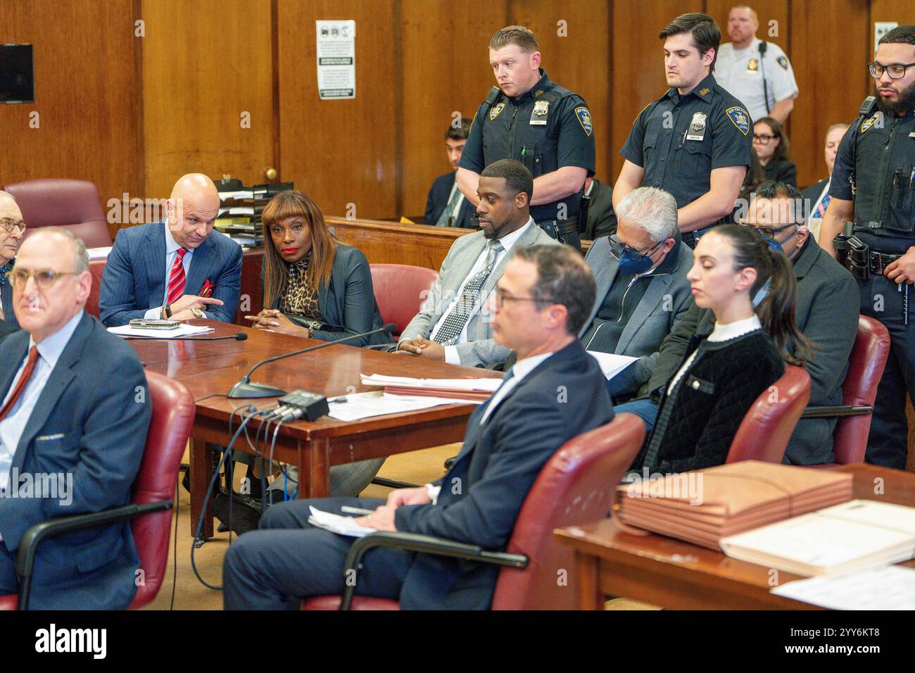 Ingrid Lewis-Martin, third from left, confers with attorney Arthur ...