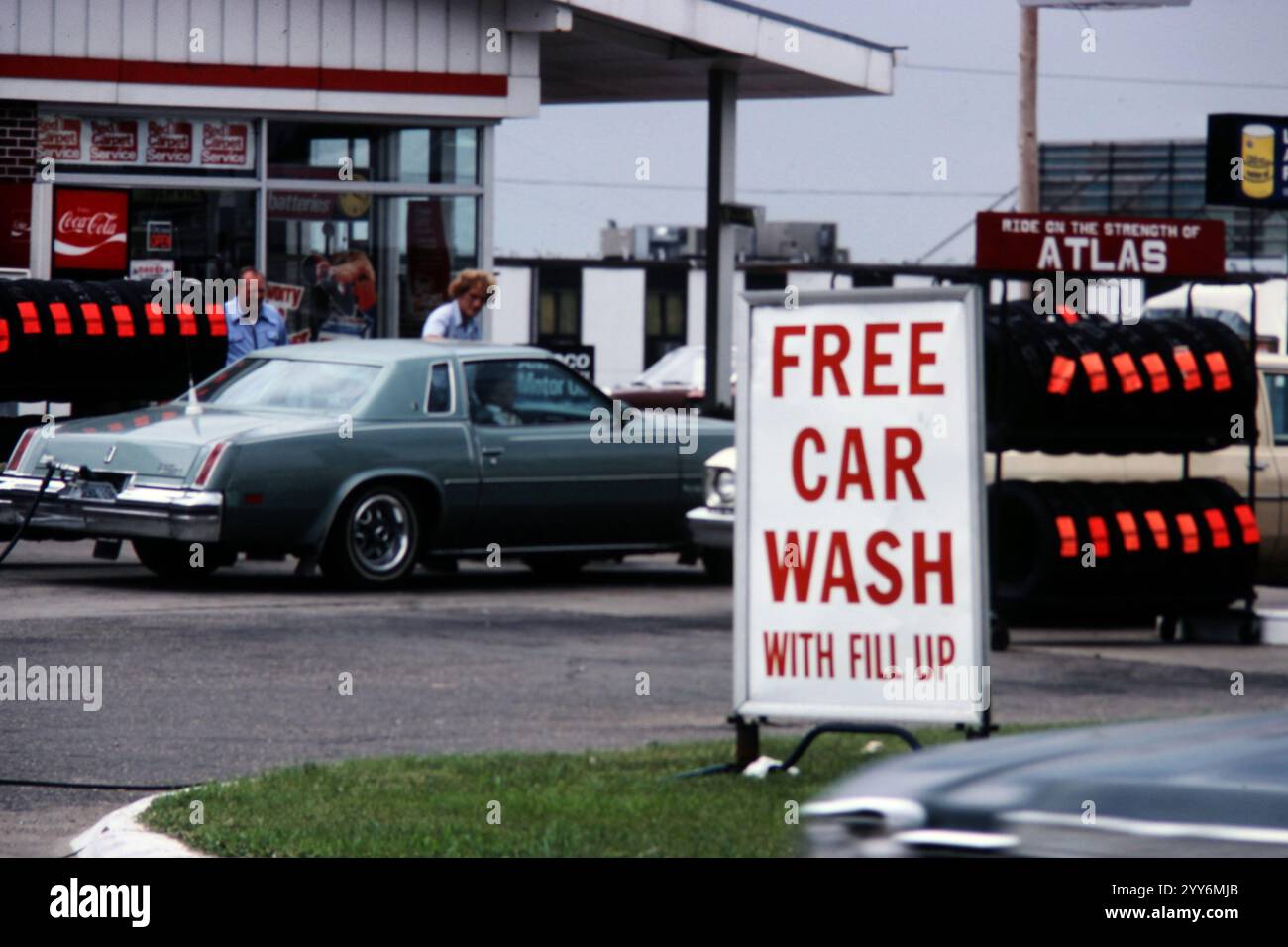 Sign at gas station in July 1979 Photograph by Dennis Brack bb933 Stock ...