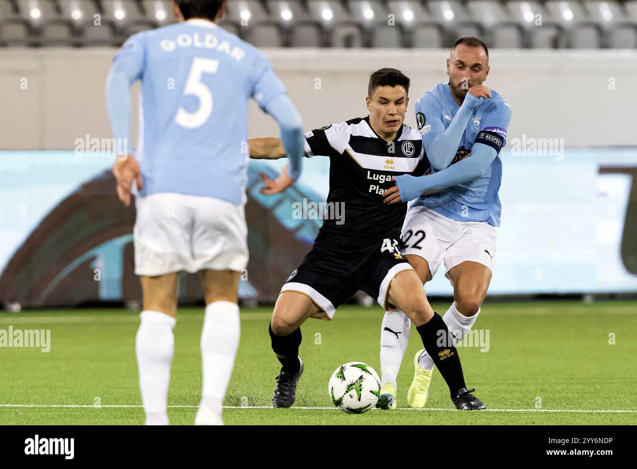 Lugano's Mattia Zanotti and Pafos's Muamer Tankovic, right, in action ...