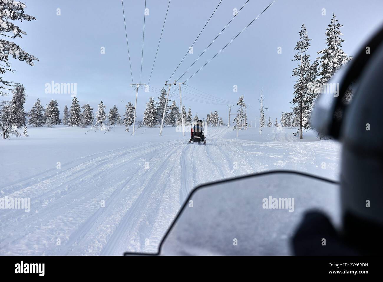 Snow mobile trip in Lapland as a passenger Stock Photo - Alamy