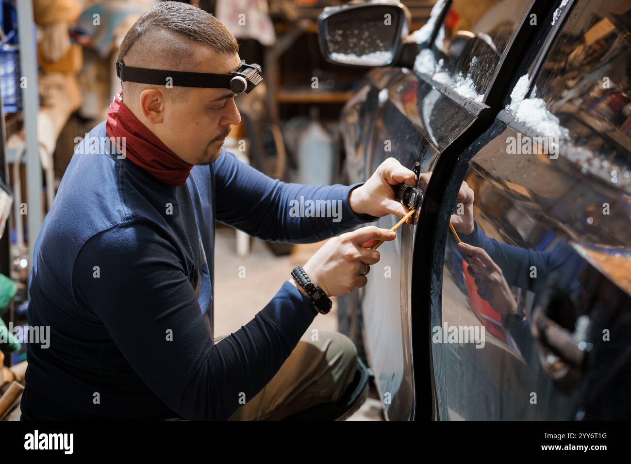 Mechanic repairing car door hi-res stock photography and images - Alamy