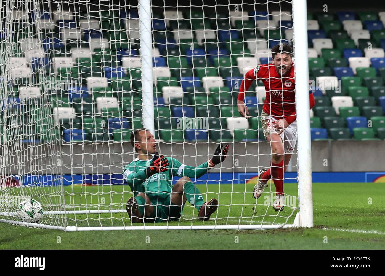 Larne's Tomas Cosgrove celebrates scoring their side's first goal of ...