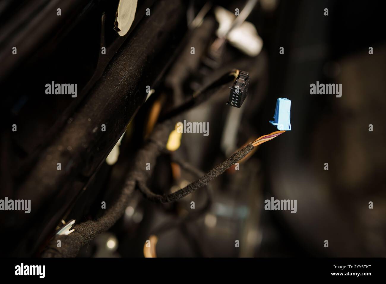 Intricate Close-Up of Automotive Electrical Wiring with Connectors ...
