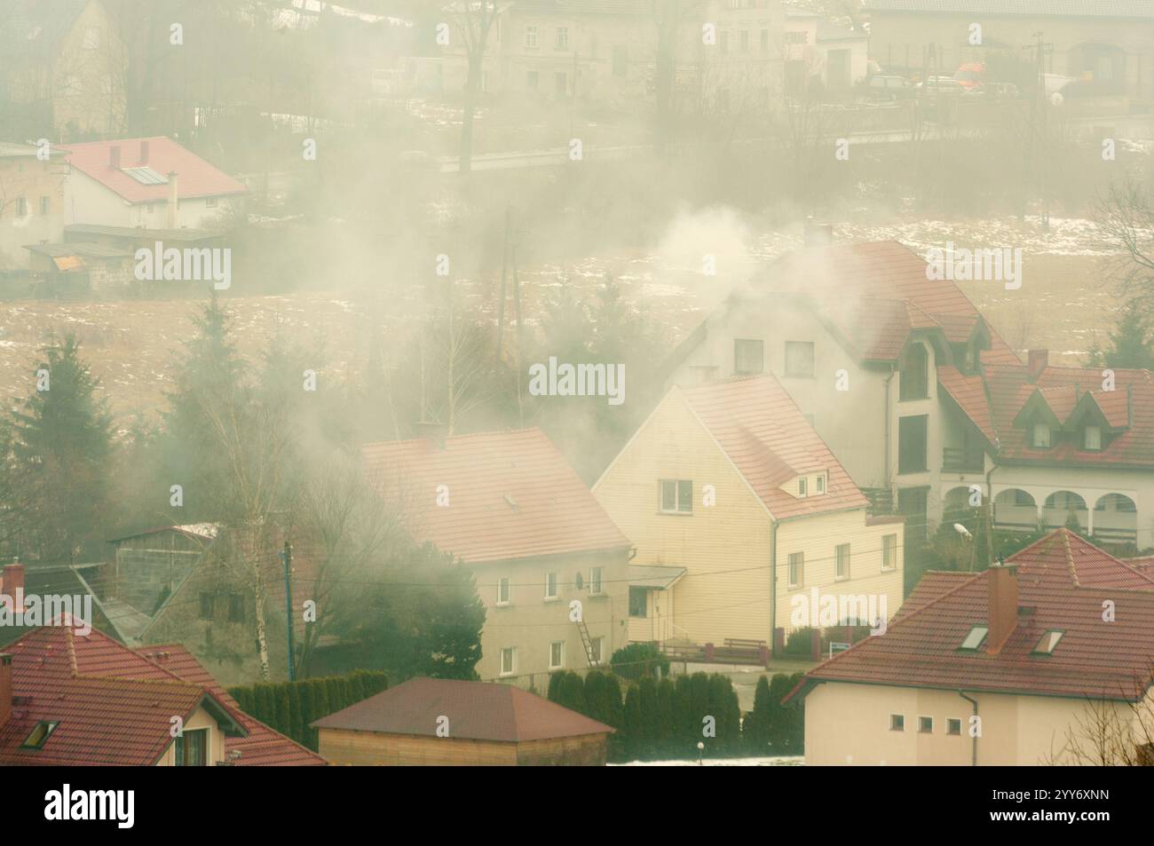 Heating house in a small town Stock Photo - Alamy