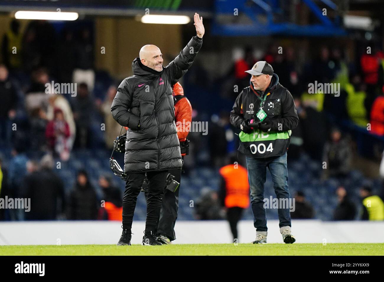 Chelsea manager Enzo Maresca (left) after the UEFA Europa Conference ...