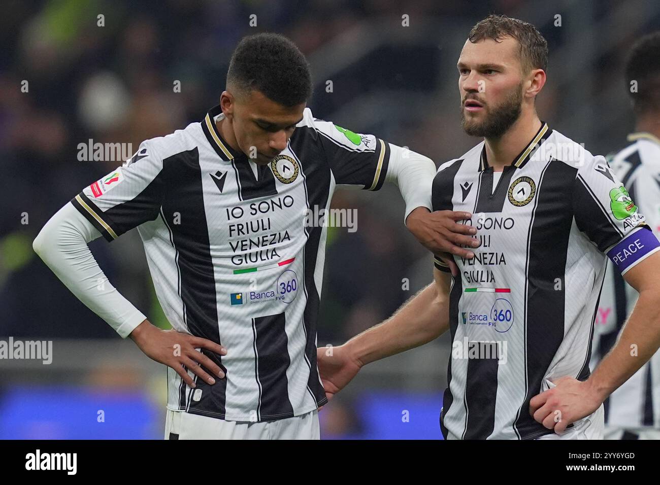 Milano, Italia. 19th Dec, 2024. Udinese's Rui Modesto, Udinese's Jesper ...