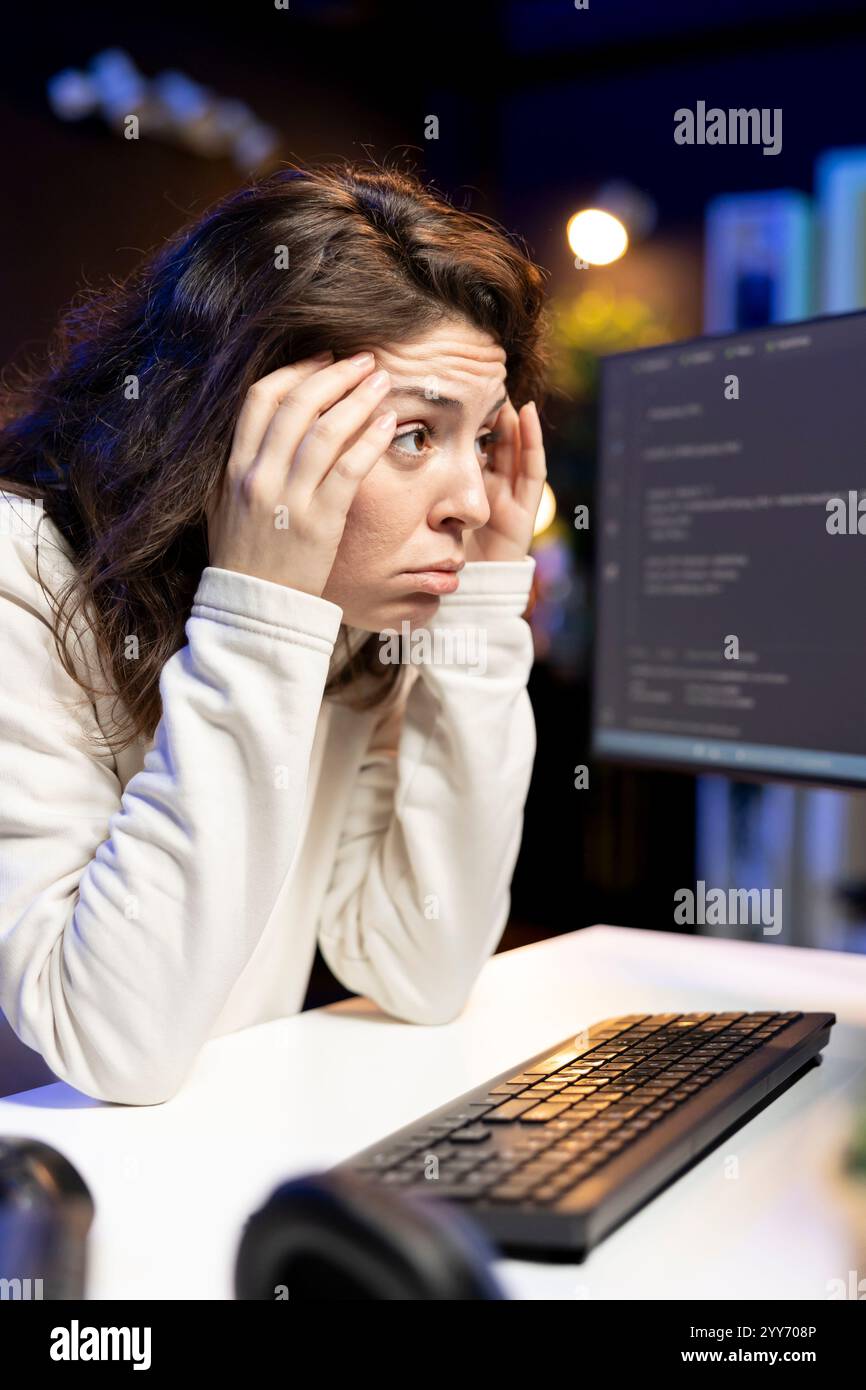 Stressed programmer rubbing temples, trying to fix vulnerabilities in software systems ...
