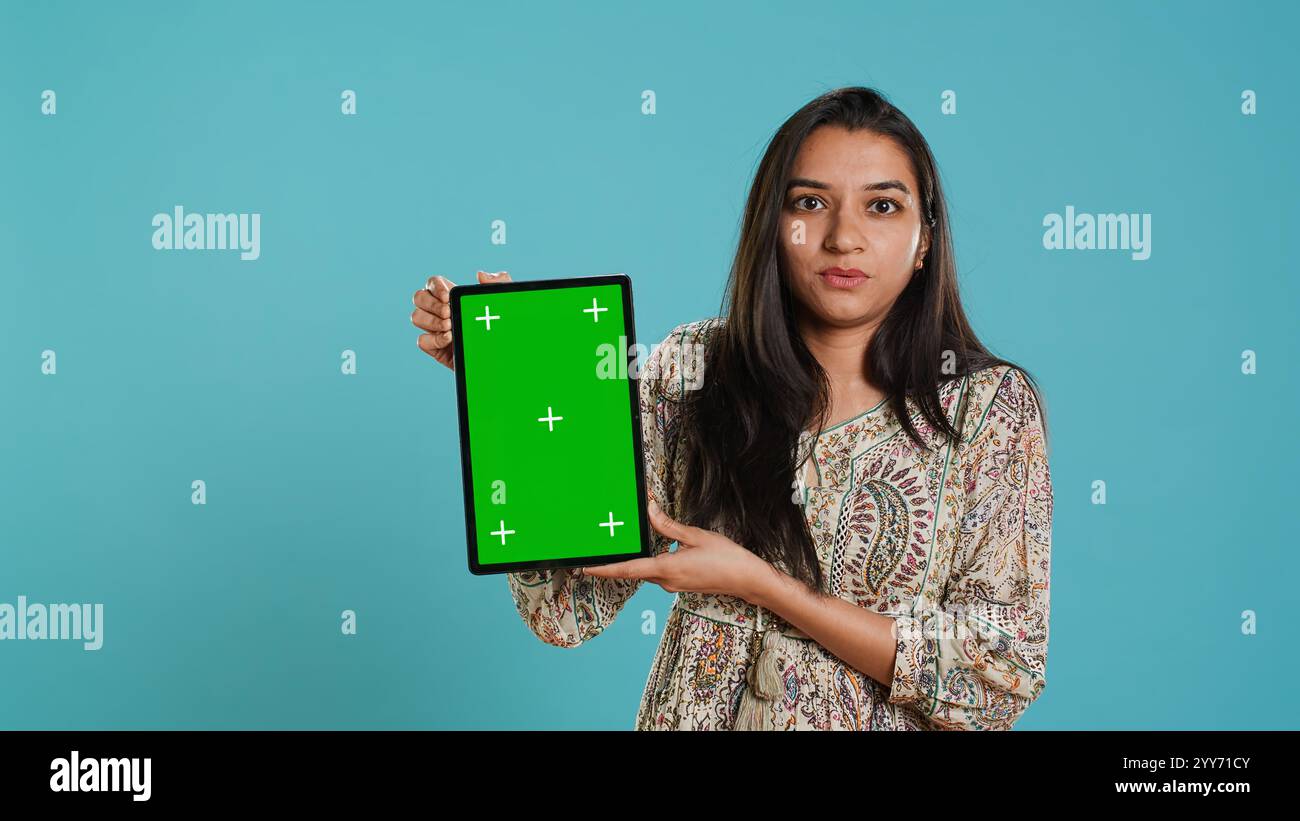 Person doing influencer marketing using isolated screen tablet, studio ...