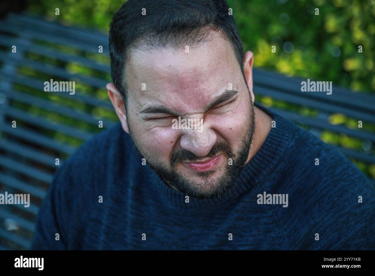 Man Shows Disgust After Lemon Bite Stock Photo - Alamy