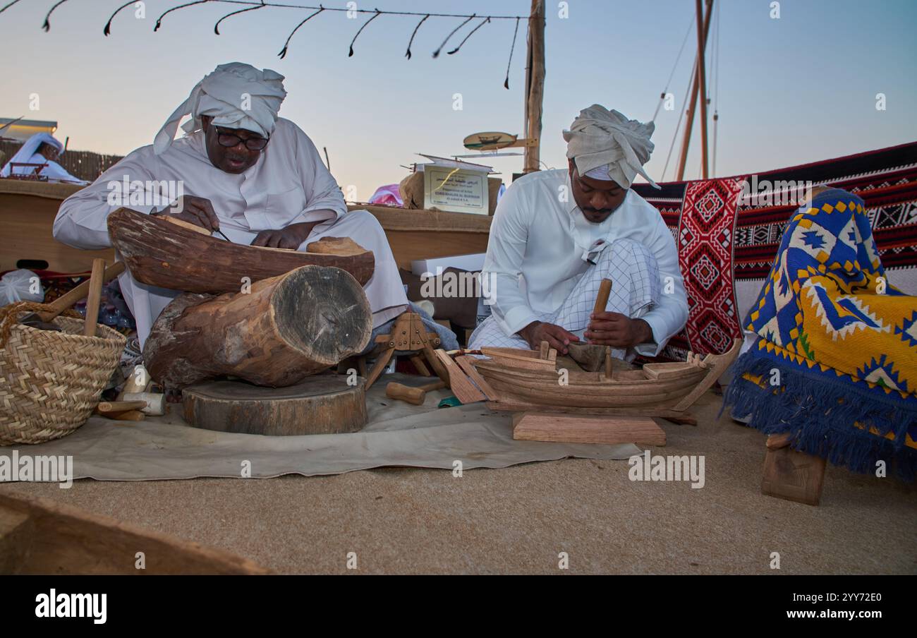 traditional Arabic carpenters (dhow makers) working in Katara cultural ...