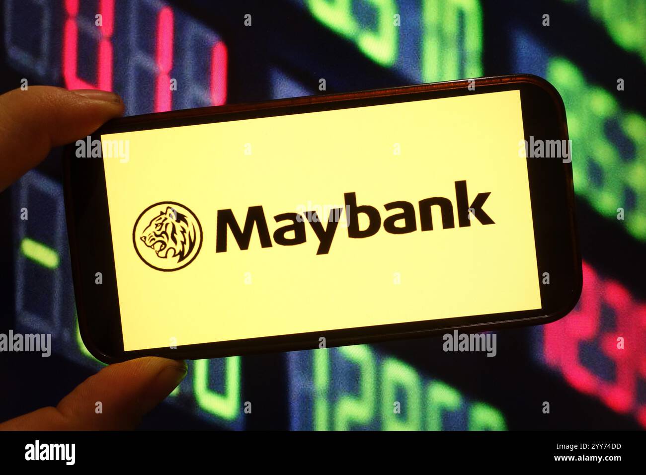 In this photo illustration, the Maybank company logo is seen displayed ...
