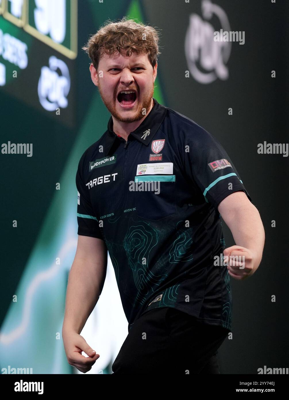 Kevin Doets celebrates winning his second round match against Michael ...
