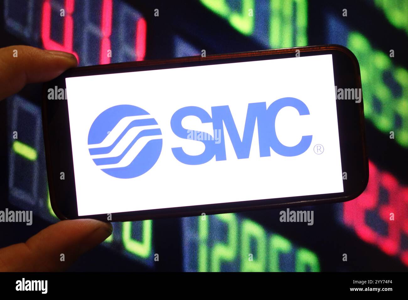 In this photo illustration, the SMC Corporation company logo is seen displayed on a smartphone ...
