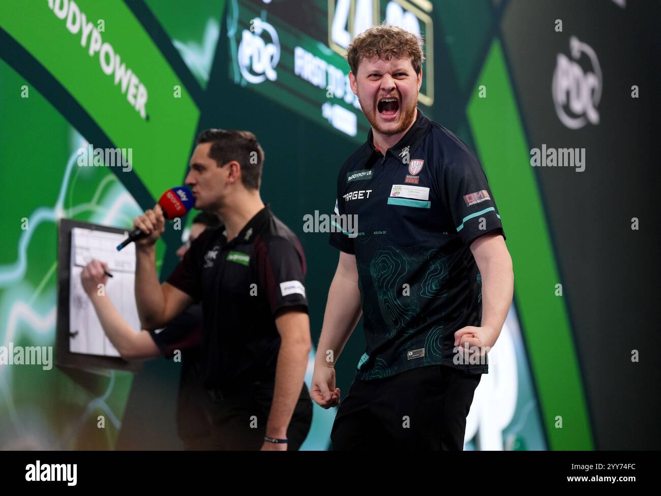 Kevin Doets celebrates winning his second round match against Michael ...