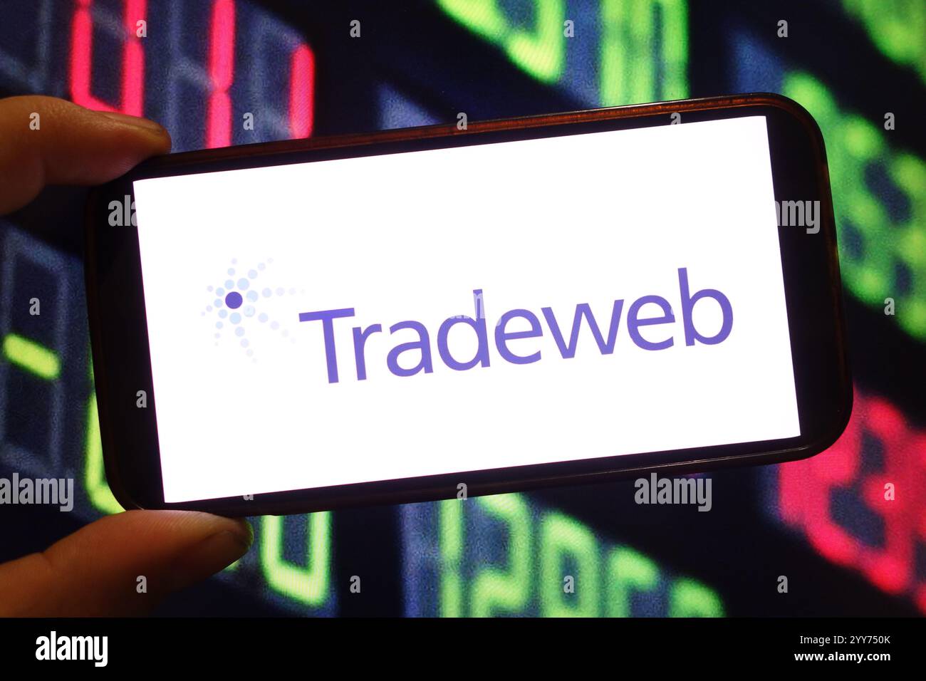 In this photo illustration, the Tradeweb company logo is seen displayed ...