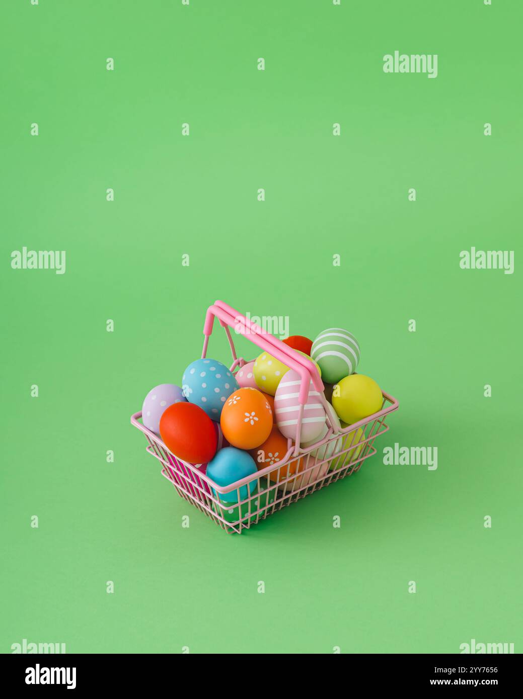 Easter composition made with colorful Easter eggs in pink shopping ...