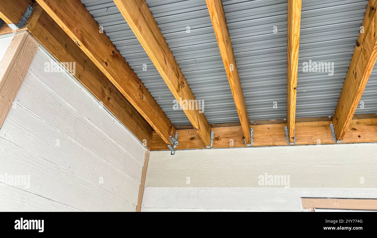 Exposed Wood Beam Ceiling With Metal Roof Stock Photo - Alamy